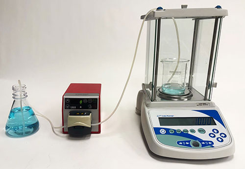 Paristaltic Pump and A Balance on a Table